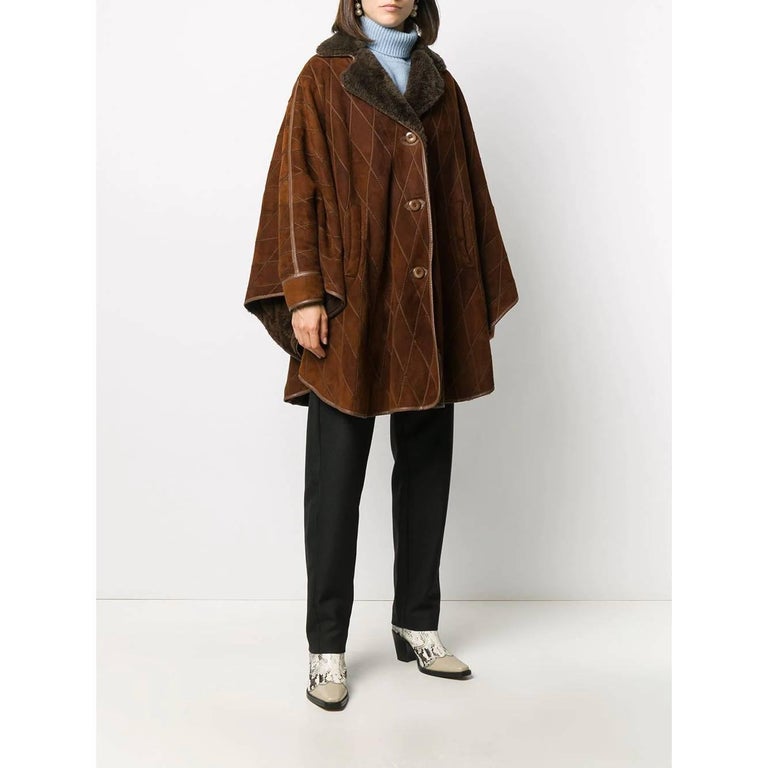 1980s A.N.G.E.L.O. Vintage Cult Shearling Cape at 1stDibs