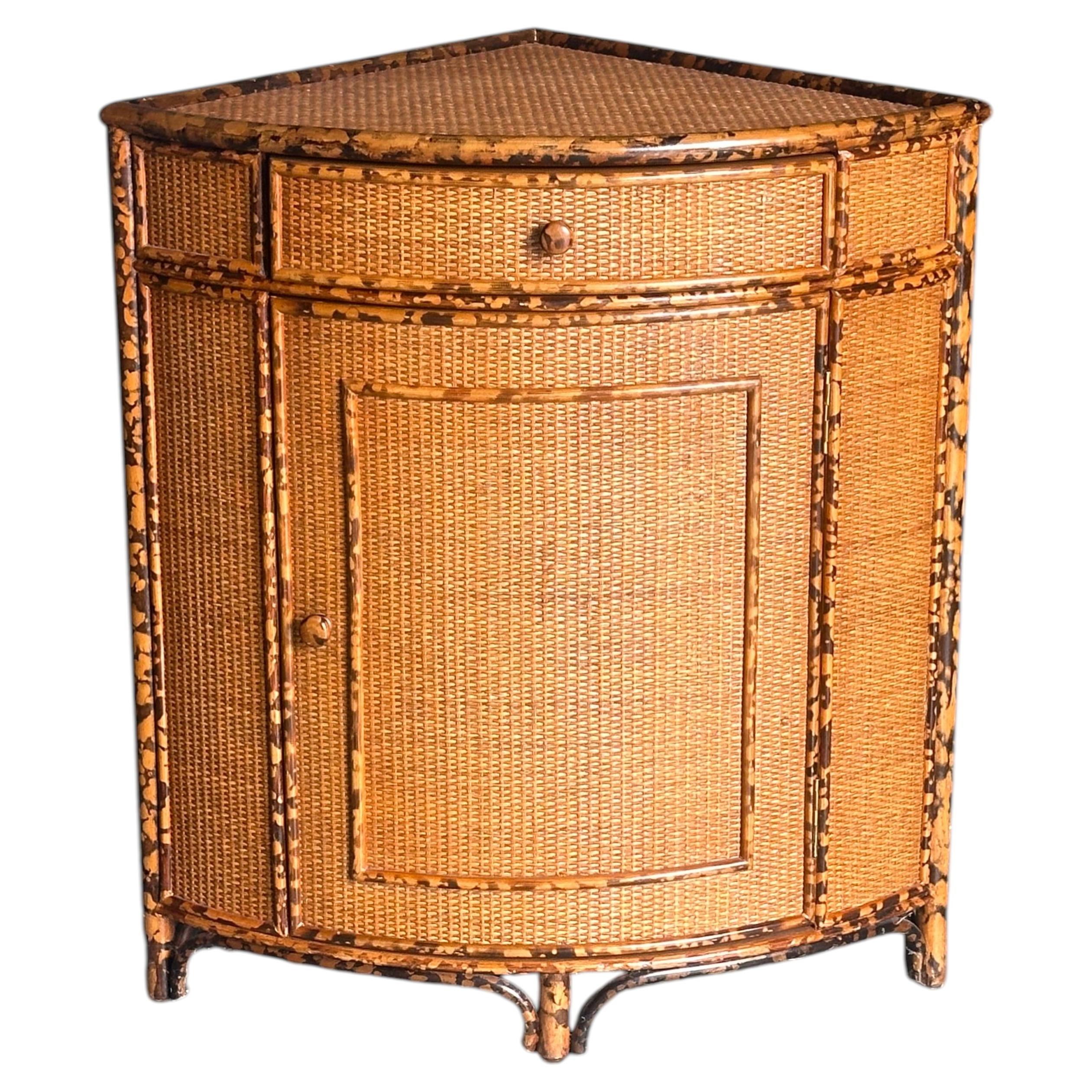 1980s British Colonial Style Bamboo and Cane Corner Cabinet at 1stDibs