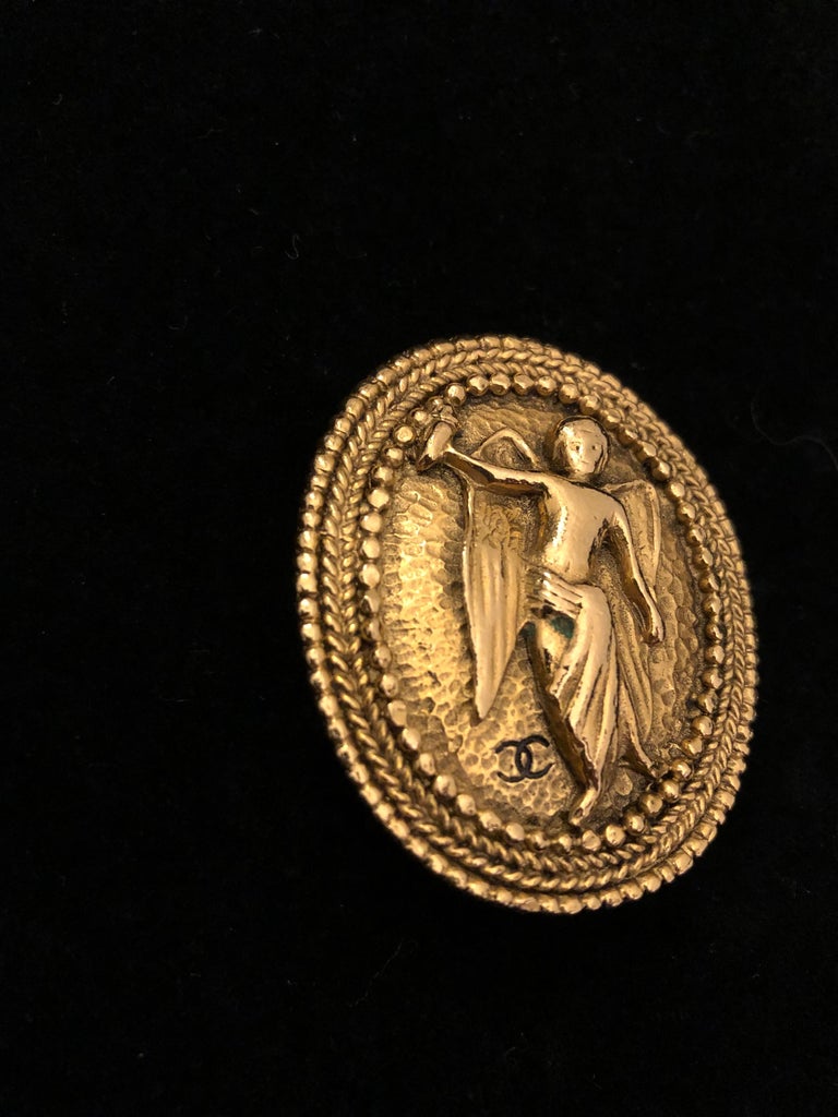 1980s CHANEL Gold Toned Angel Brooch at 1stDibs