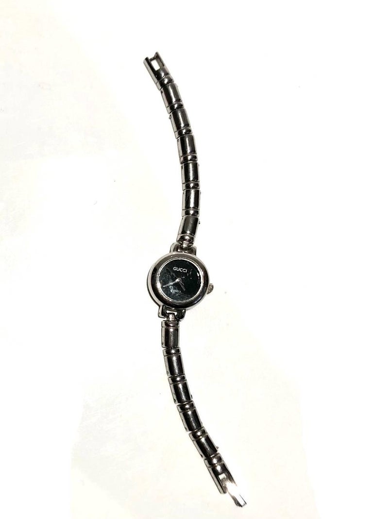 1980s Gucci Round Face Bamboo Steel wrist watch at 1stDibs