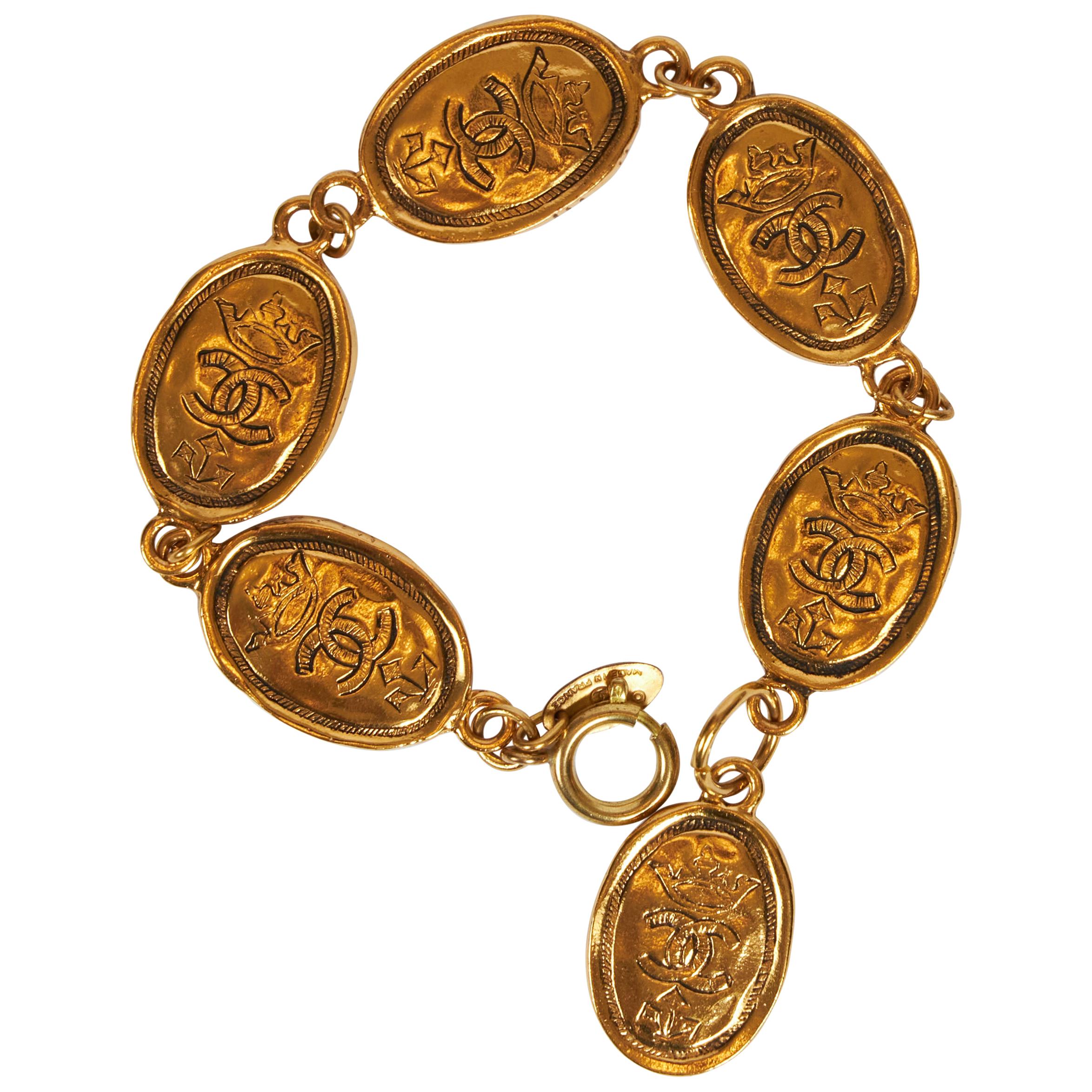 1980's Vintage Chanel Embossed Oval Gold Coin Bracelet at 1stDibs ...