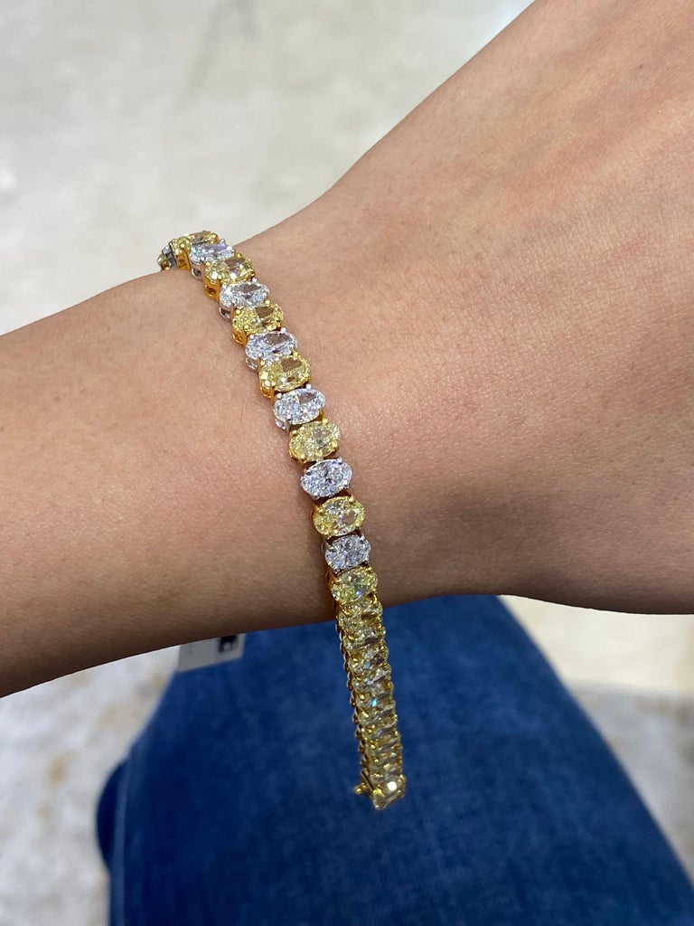 19.84 Carat Oval Shaped Yellow and White Diamond Tennis Bracelet at 1stDibs
