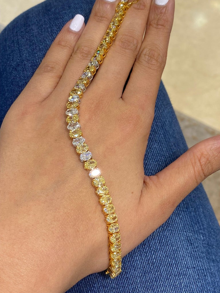 19.84 Carat Oval Shaped Yellow and White Diamond Tennis Bracelet at 1stDibs