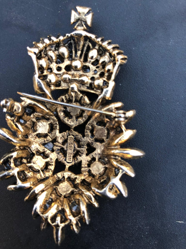 1984 R. Serbin Crystal Royal Crest Brooch Pin For Sale at 1stDibs