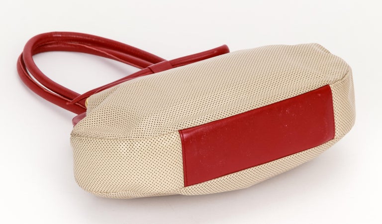 1990's Vintage Chanel Beige and Red Perforated Bow Bag at 1stDibs