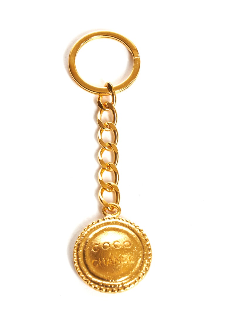 1990's Vintage Chanel Gold Coin Keychain at 1stDibs