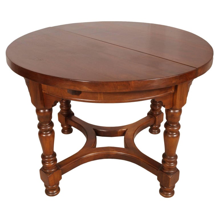 antique round extendable table