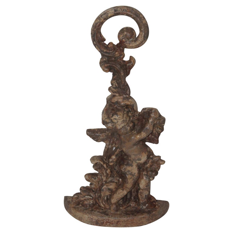 19th Century Angel Painted Iron Door Stop at 1stDibs