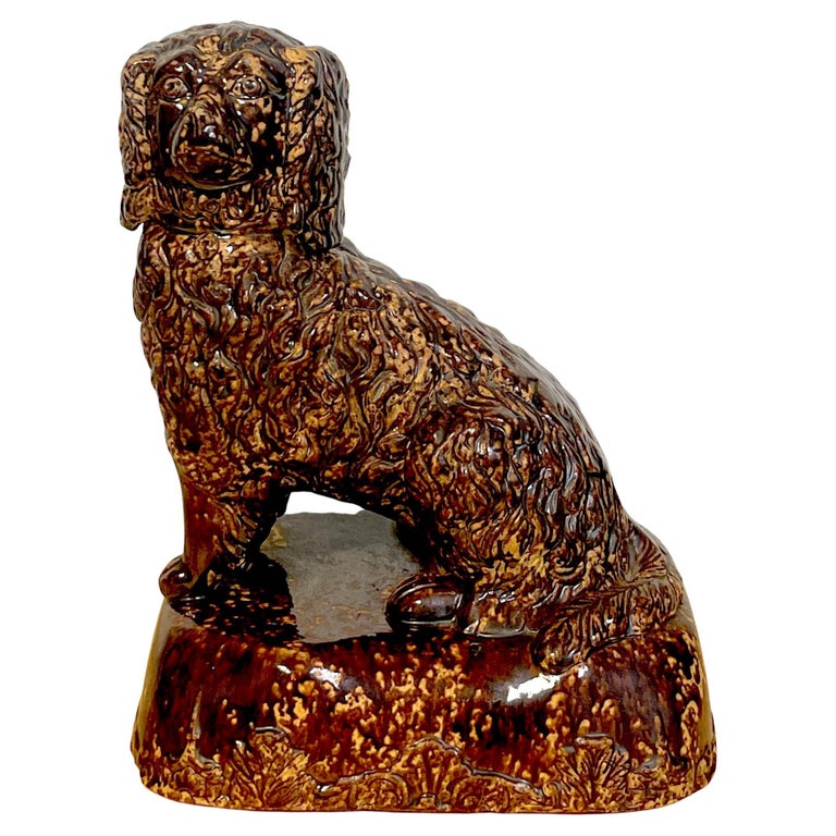 19th Century Bennington Pottery Seated Spaniel with Treacle Glaze, C ...