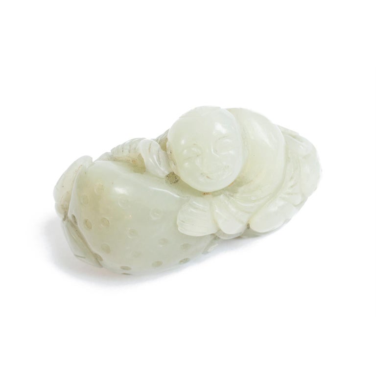 19th Century Chinese Carved Jade Charm of Boy and Lotus at 1stDibs