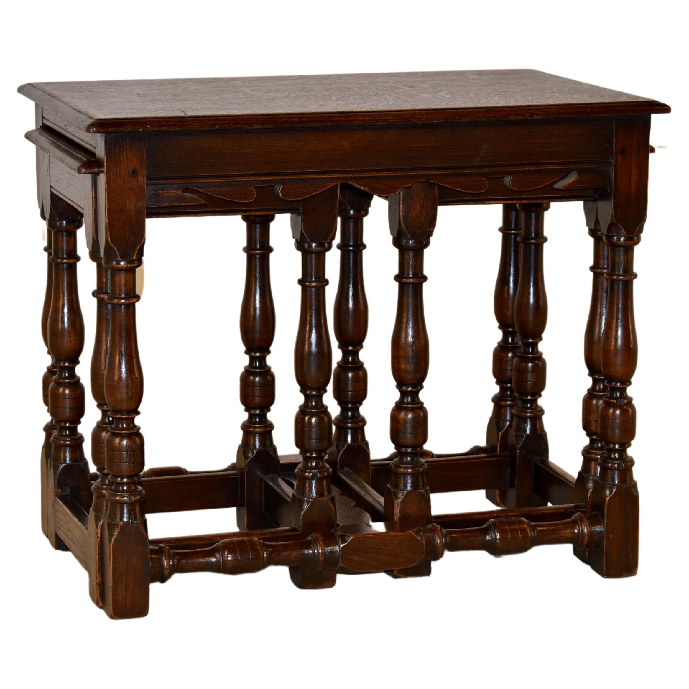 A Robert 'Mouseman' Thompson Oak nest of tables. at 1stDibs