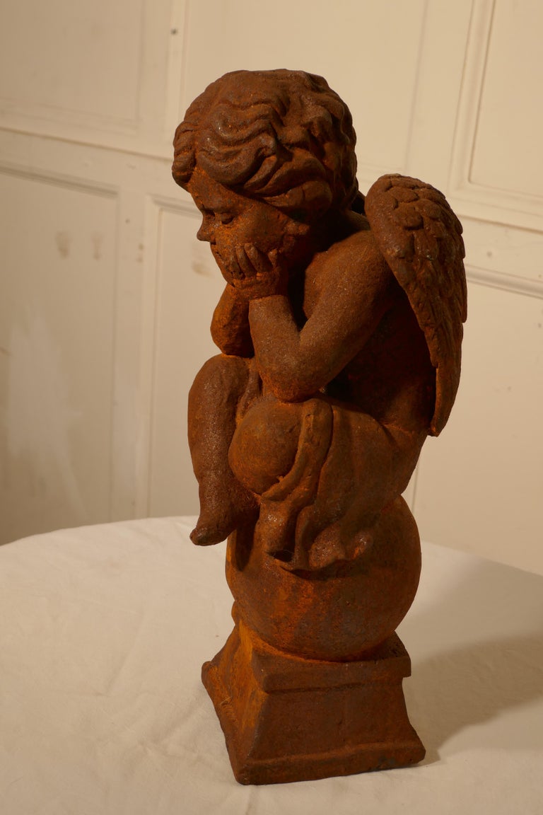 19th Century French Cast Iron Angel, Putti Deep in Thought at 1stDibs