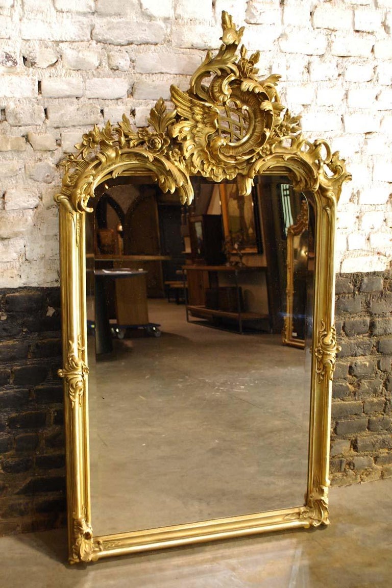 19th century French gold gilt rococo mirror with faceted glass at 1stDibs