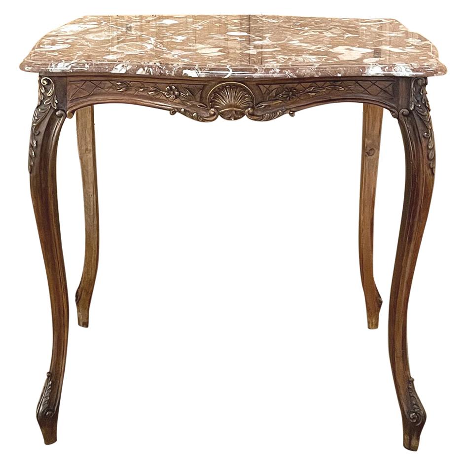 A French Walnut Louis XV Table with Brass Mounts at 1stDibs