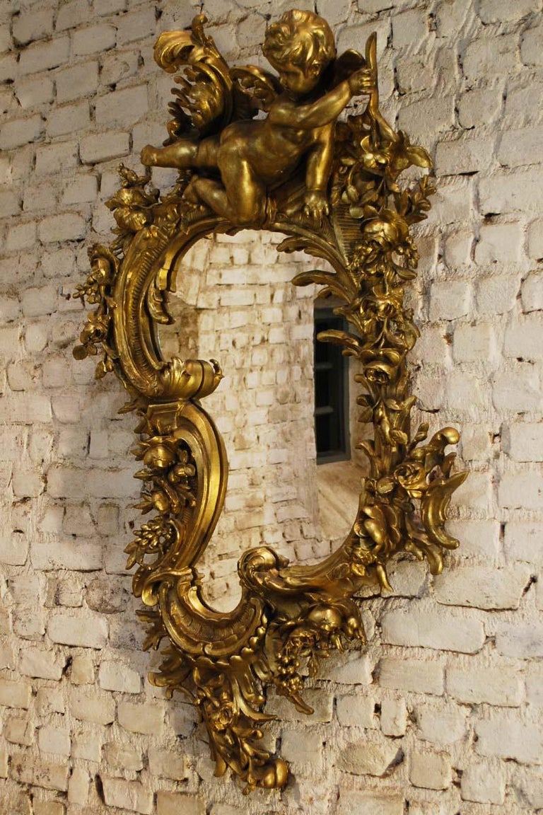 Antique 19th century Italian gold rococo wall mirror with large cherub ...
