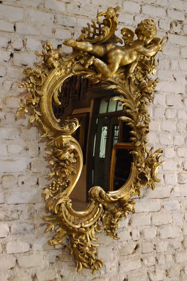 Antique 19th century Italian gold rococo wall mirror with large cherub ...