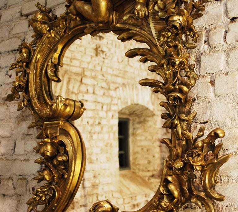 Antique 19th century Italian gold rococo wall mirror with large cherub ...