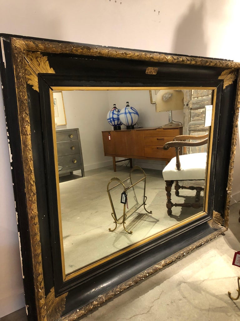 19th Century Large Gilded and Ebonized Mirror For Sale at 1stDibs
