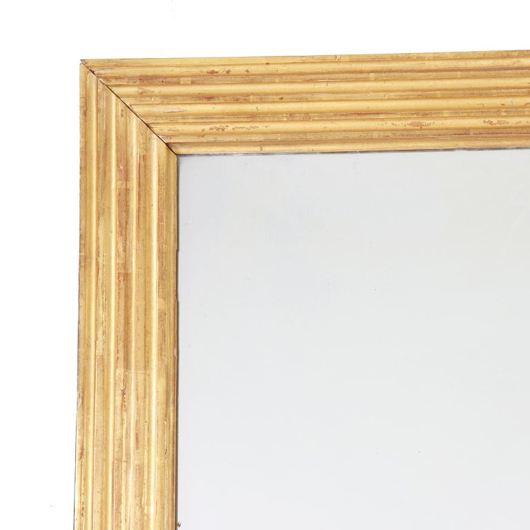 19th Century Large Giltwood Mirror with Reeded Frame For Sale at 1stDibs