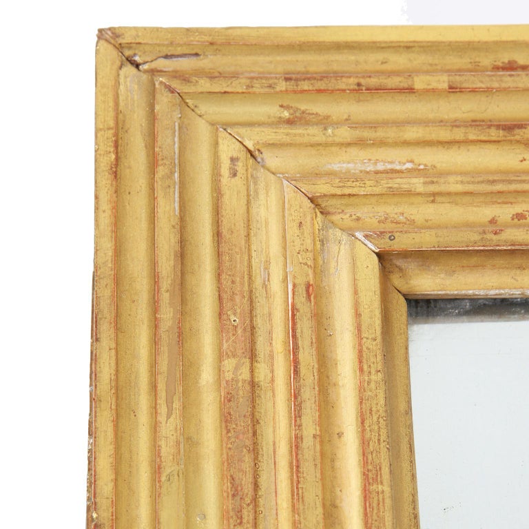 19th Century Large Giltwood Mirror with Reeded Frame For Sale at 1stDibs