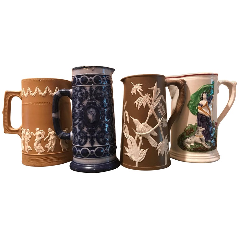 19th Century Lot of Four Porcelain Relief Pitchers For Sale at 1stDibs