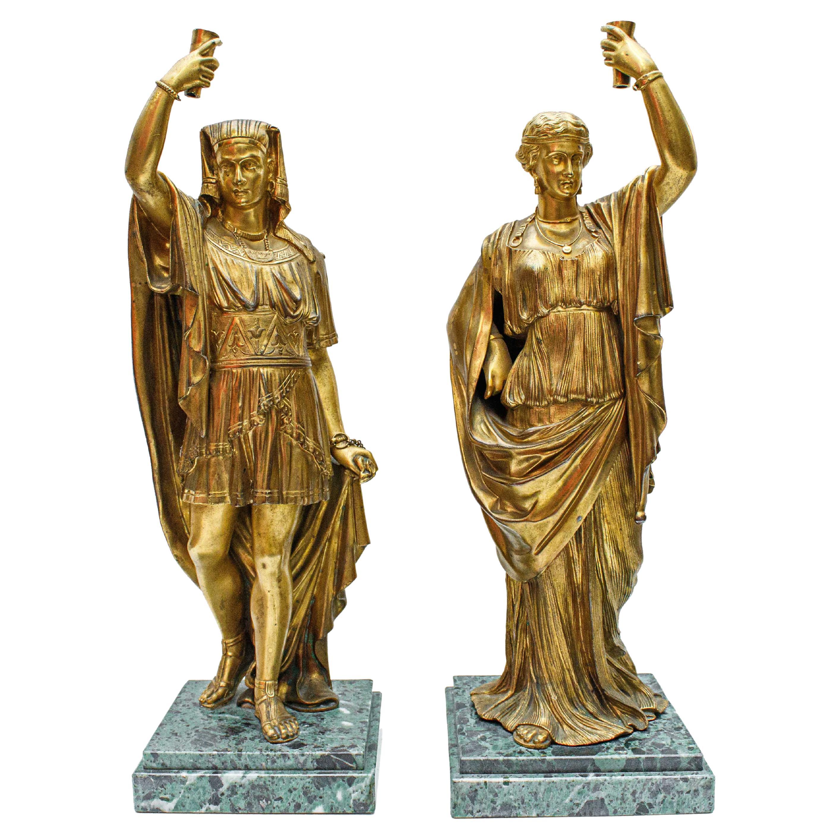 XIX secolo, Coppia di figure classiche che reggono una torcia in bronzo ...