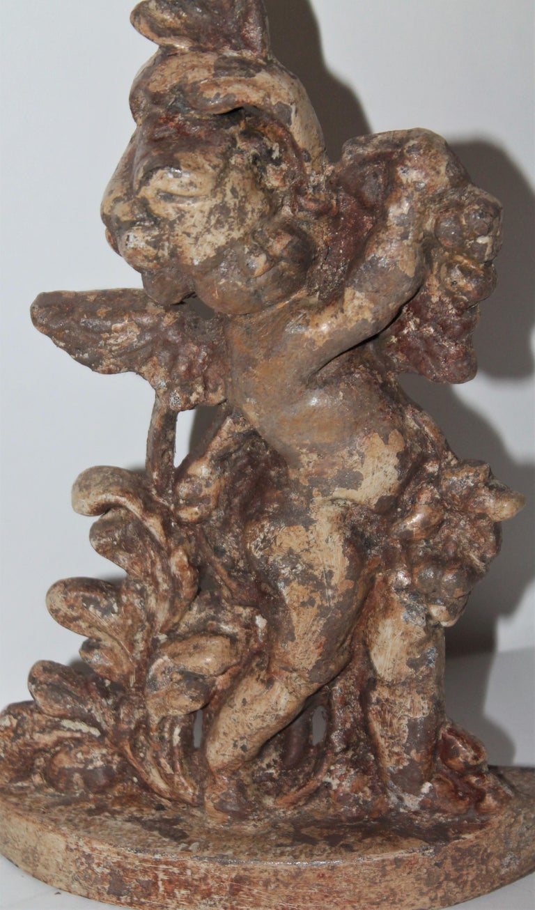 19th Century Angel Painted Iron Door Stop For Sale at 1stDibs
