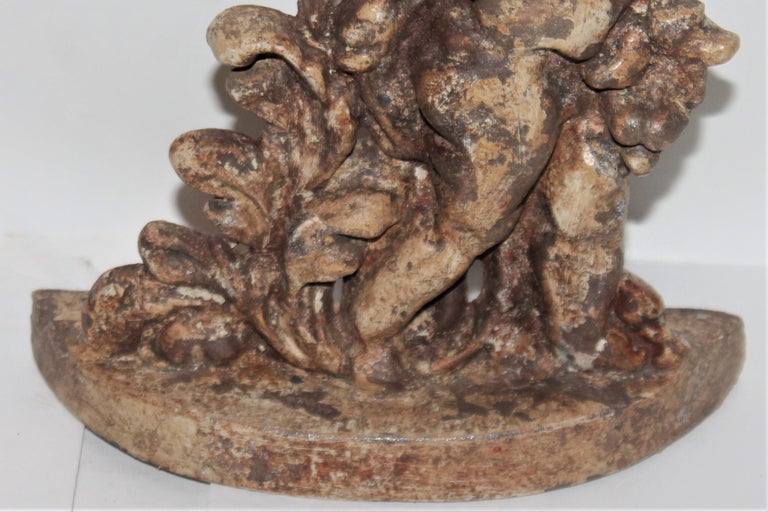 19th Century Angel Painted Iron Door Stop For Sale at 1stDibs