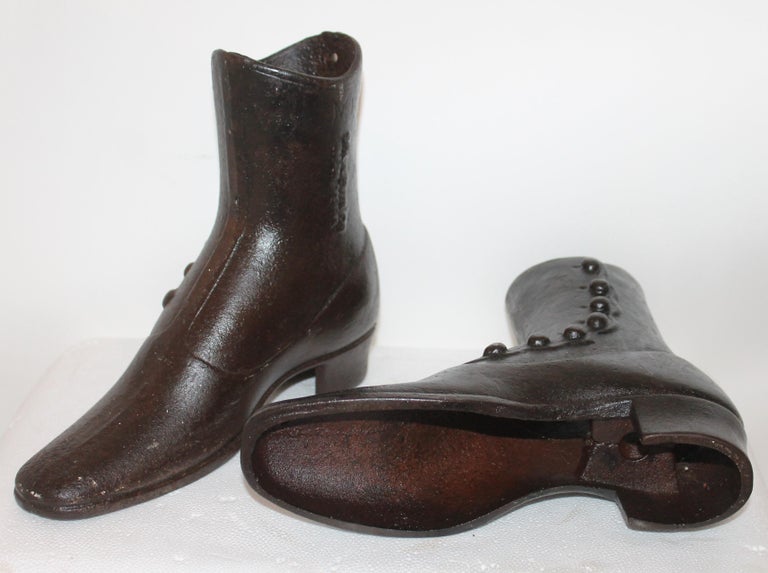 19th Century Pair Cast Iron Boots Signed New York City For Sale at 1stDibs