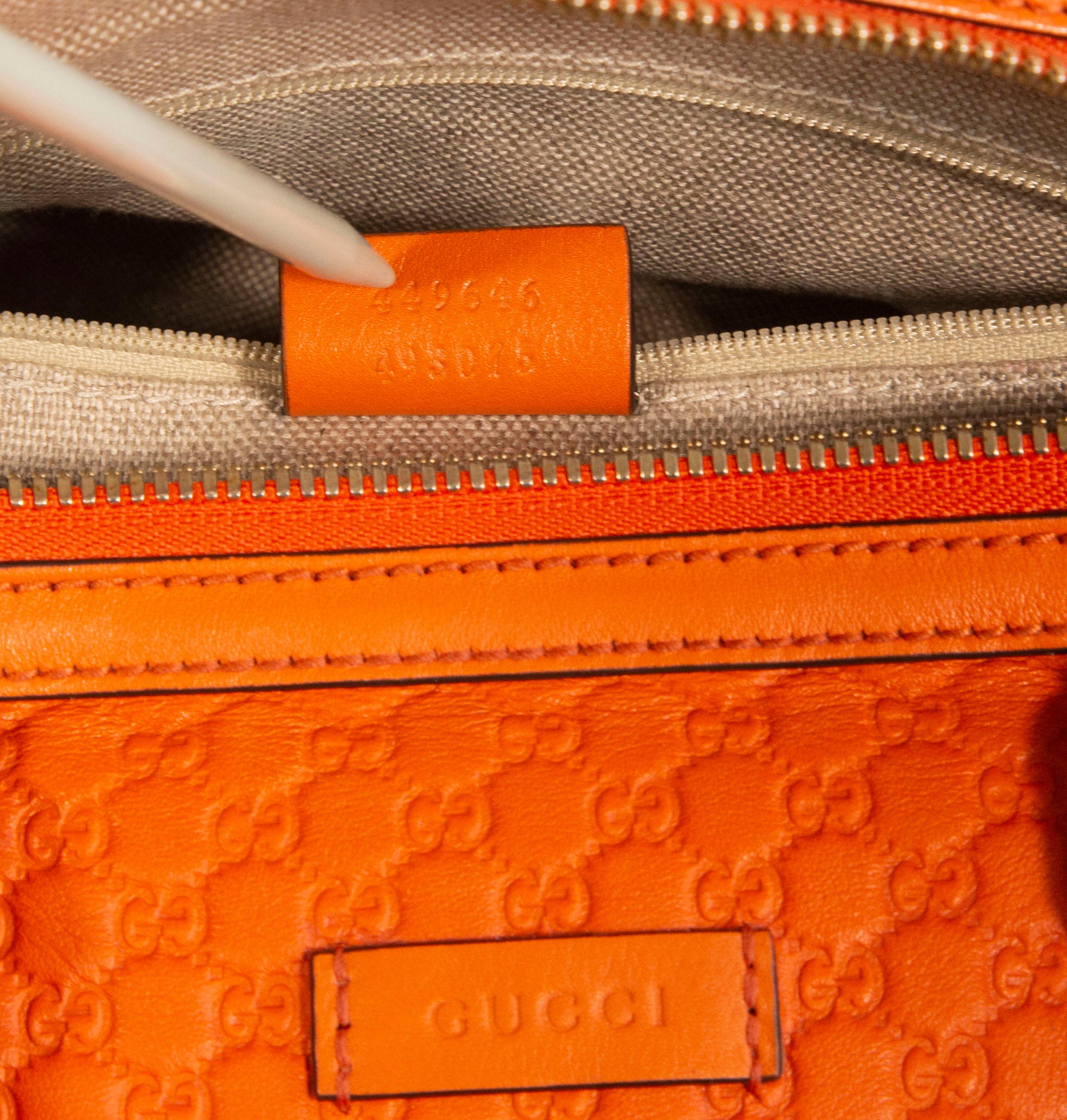 2000s Gucci Orange GG Embossed Leather Boston Bag For Sale at 1stDibs