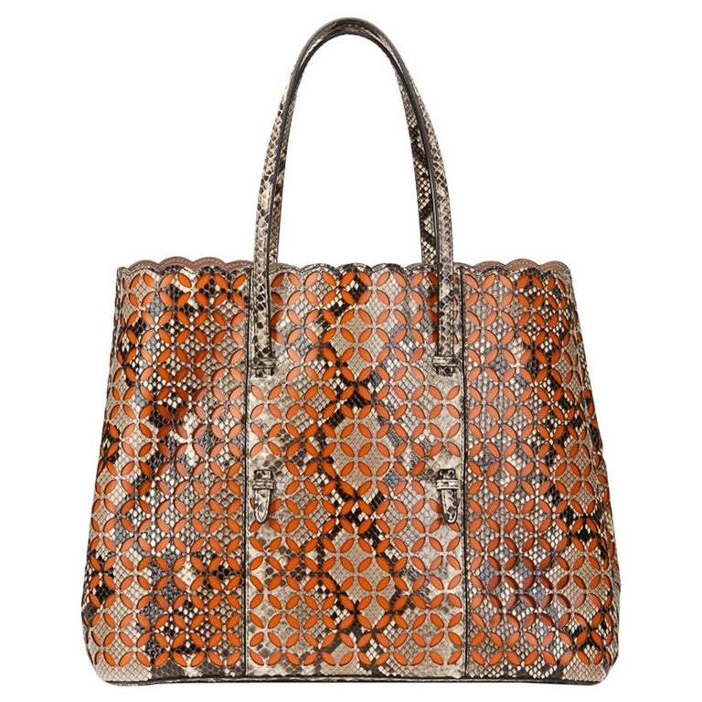2001 Alaia Python Leather and Orange Calfskin Leather Perforated ...