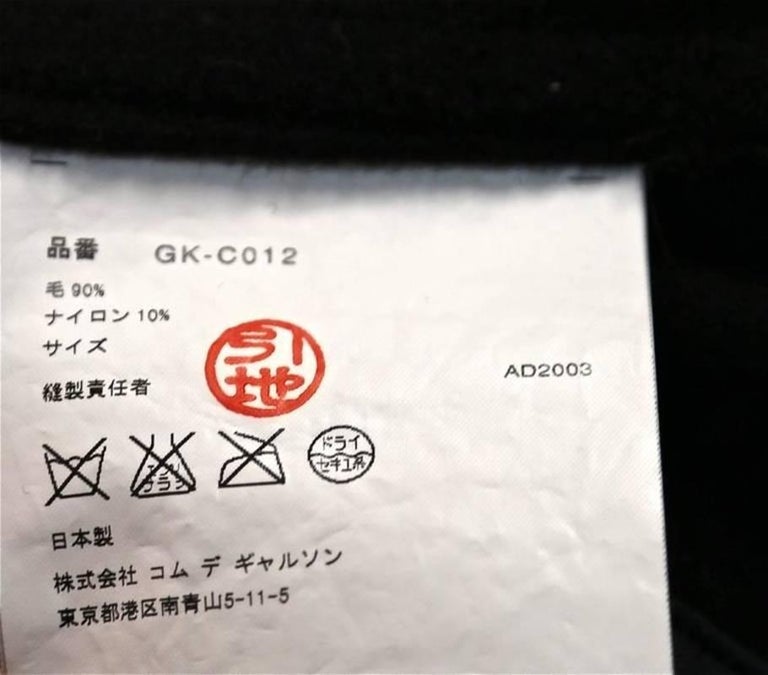 2003 COMME DES GARCONS jet black wool coat with knot detail For Sale at ...