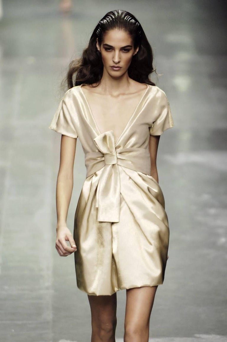 2006 ALEXANDER MCQUEEN cream silk runway dress with bow detail at ...