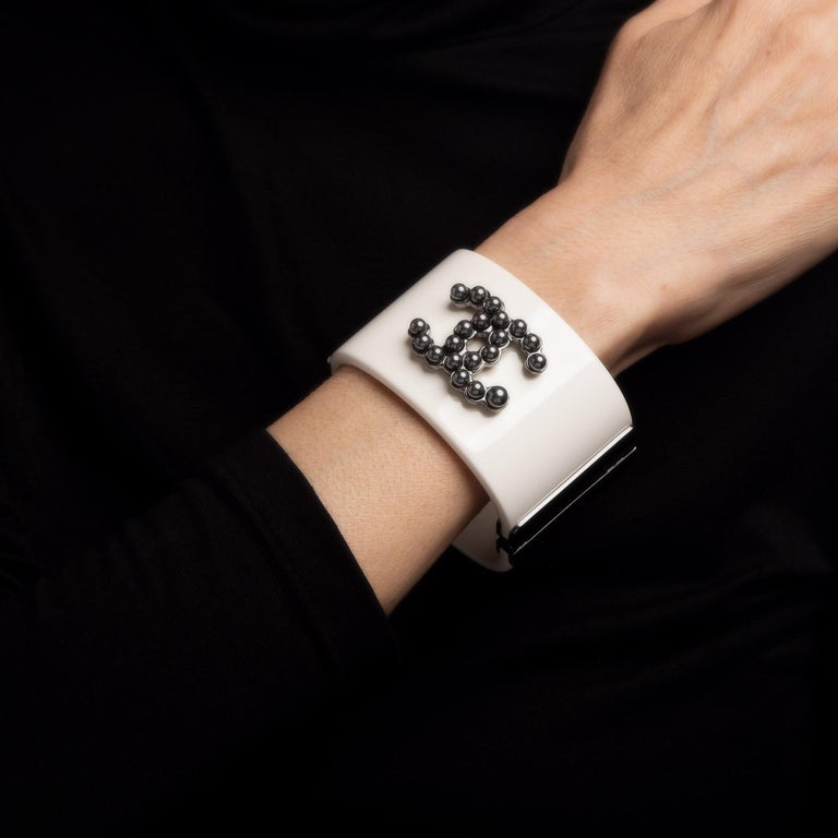 2015 Chanel White Resin Cuff Bracelet Faux Grey Pearl CC Logo For Sale ...