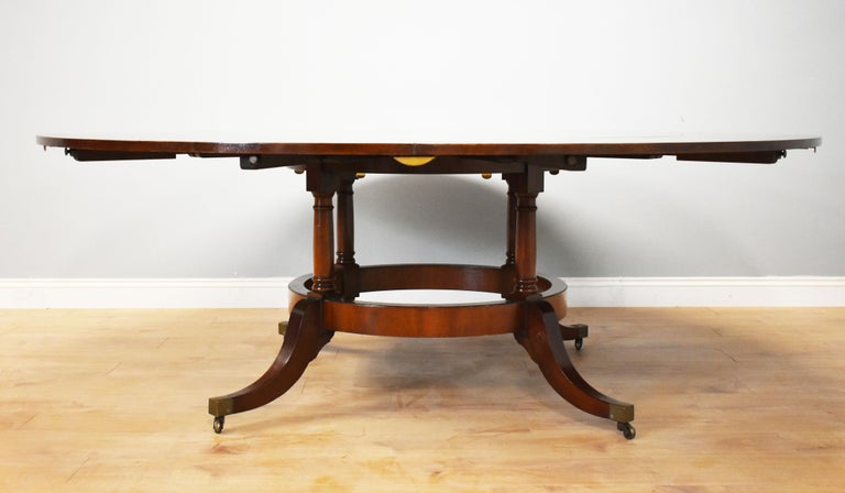 20th Century Extending Circular "Jupe" Style Dining Table and 12 Chairs ...