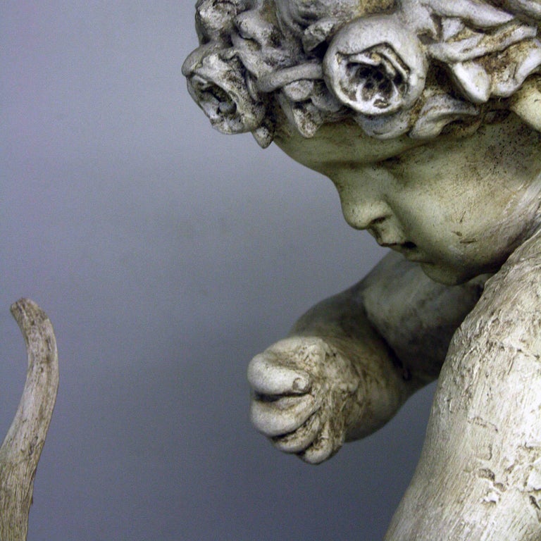 20th Century Large Plaster Cupid Statue at 1stDibs