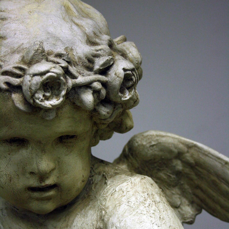 20th Century Large Plaster Cupid Statue at 1stDibs