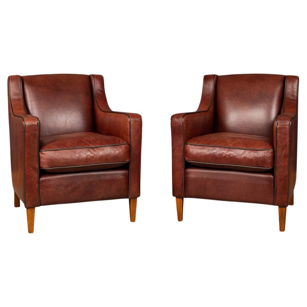 Pair of French Leather Club Chairs at 1stDibs