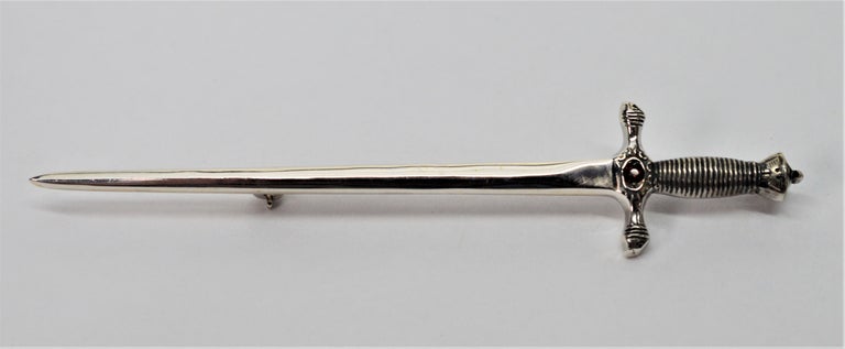 20th Century Sterling Silver Sword Pin Brooch with Garnet Accent at 1stDibs