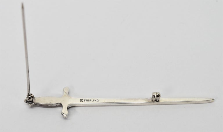 20th Century Sterling Silver Sword Pin Brooch with Garnet Accent at 1stDibs