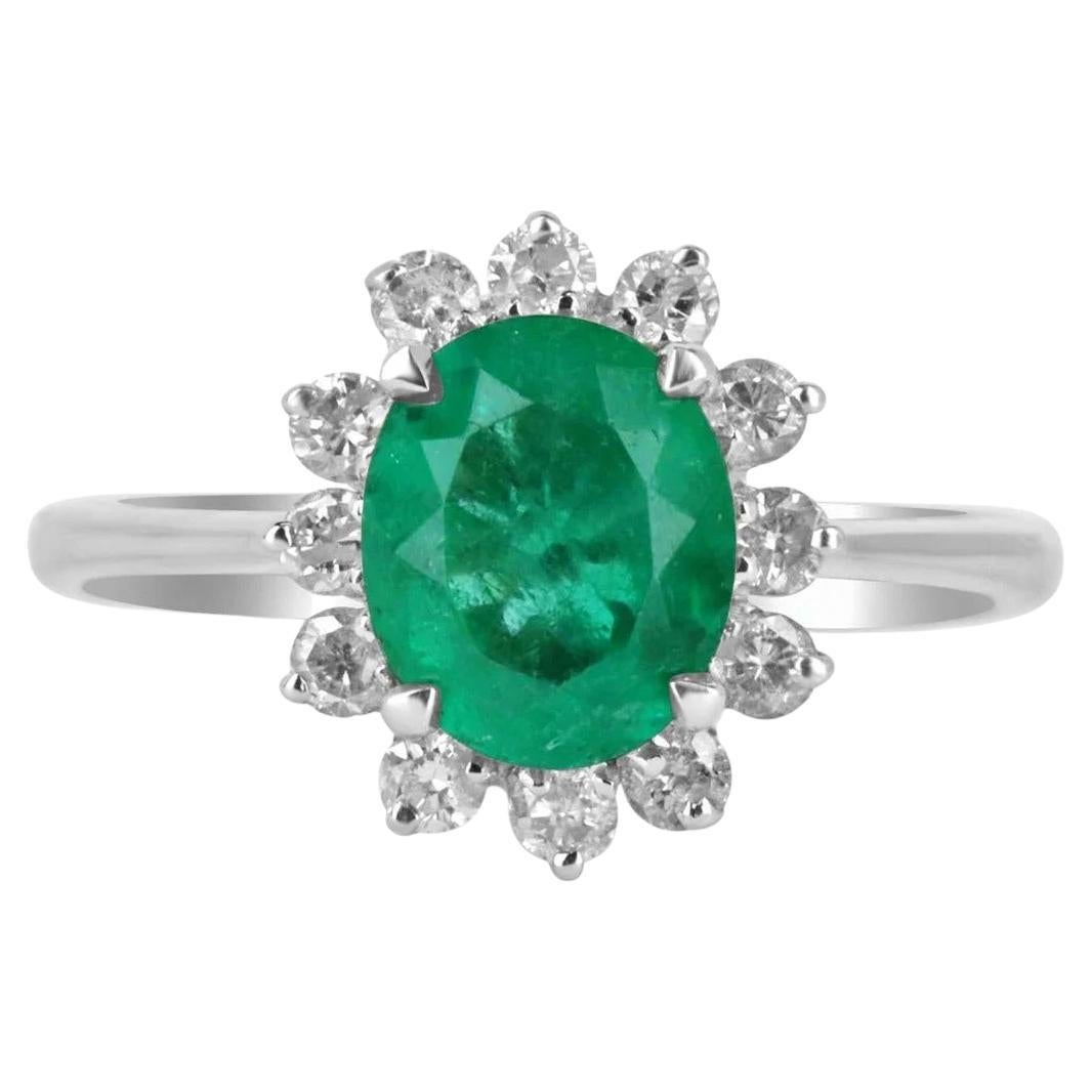 Colombian Oval cut Emerald and diamond halo ring at 1stDibs