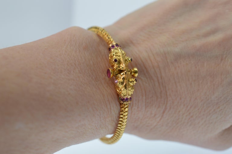 Ruby Serpent 22 Karat Yellow Gold Bangle Bracelet at 1stDibs