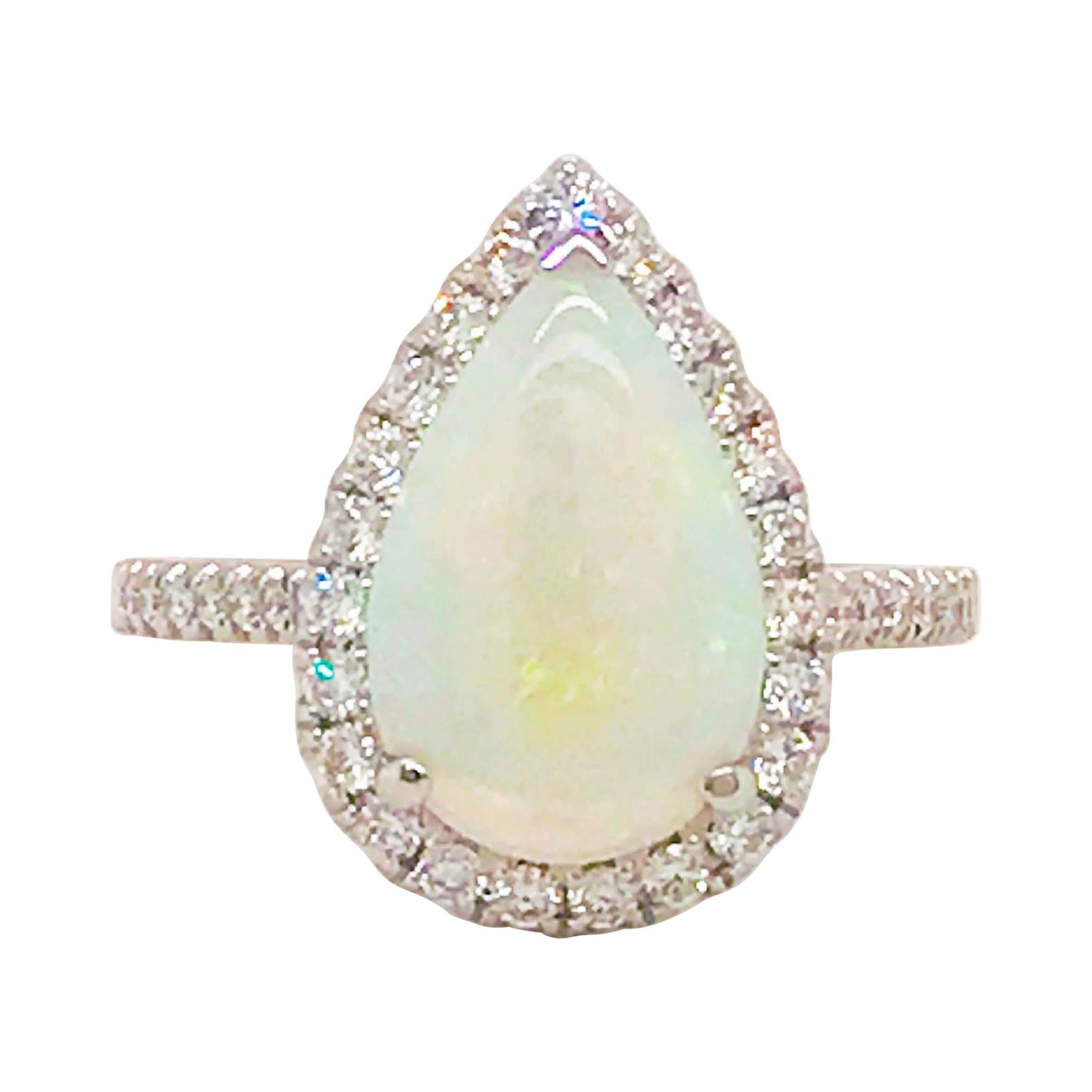 Gia Opal Oval Cabochon And Diamond Halo 18 Karat White Gold Engagement