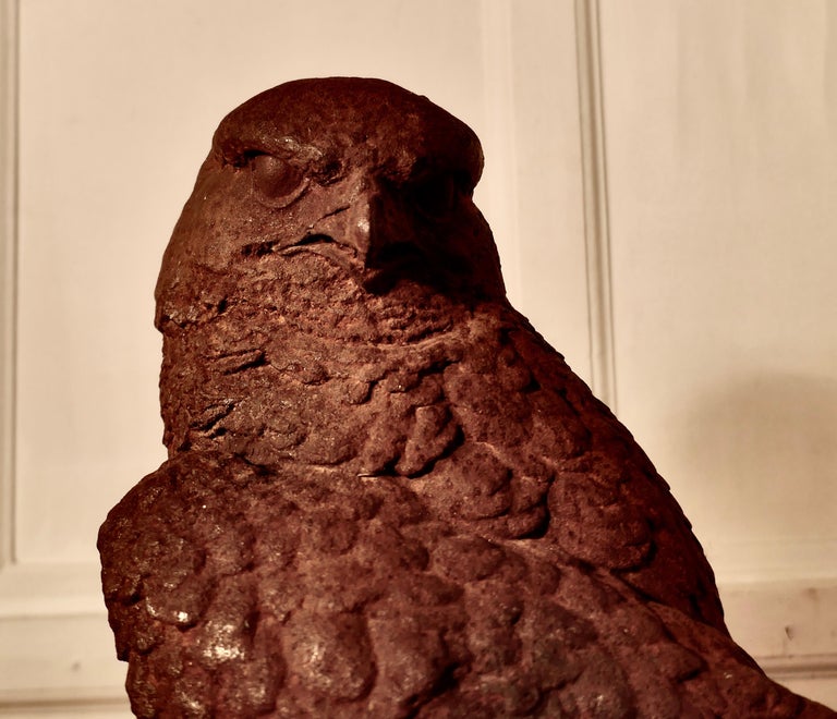 Weathered Cast Iron Statue of a Falcon on a Gloved Hand For Sale at 1stDibs