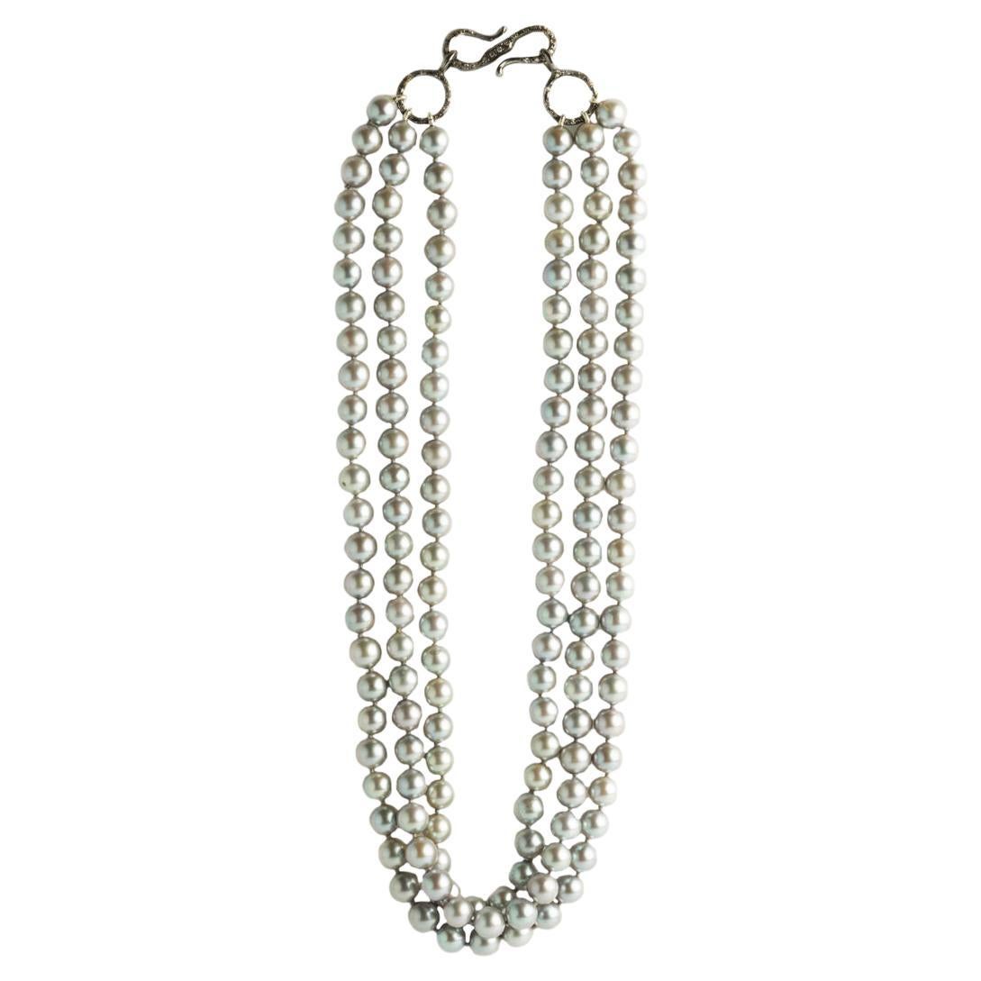 Double Strand of Nesting Pearls with a Diamond Platinum Clasp at 1stDibs