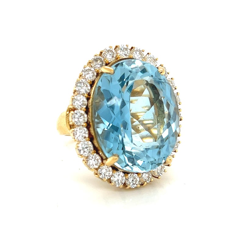33 carat Aquamarine Ring with a Diamond Halo For Sale at 1stDibs