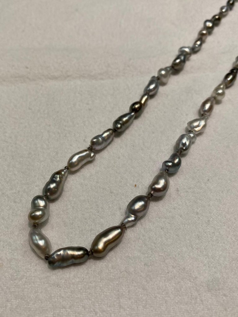 Natural Pearl with 14k White Gold Fish Hook For Sale at 1stDibs