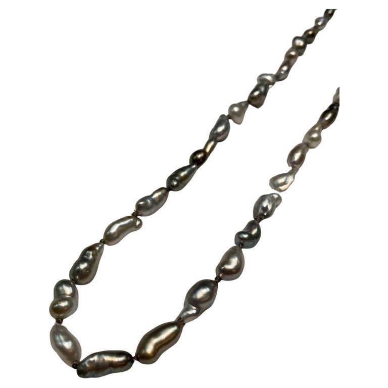 Natural Pearl with 14k White Gold Fish Hook For Sale at 1stDibs