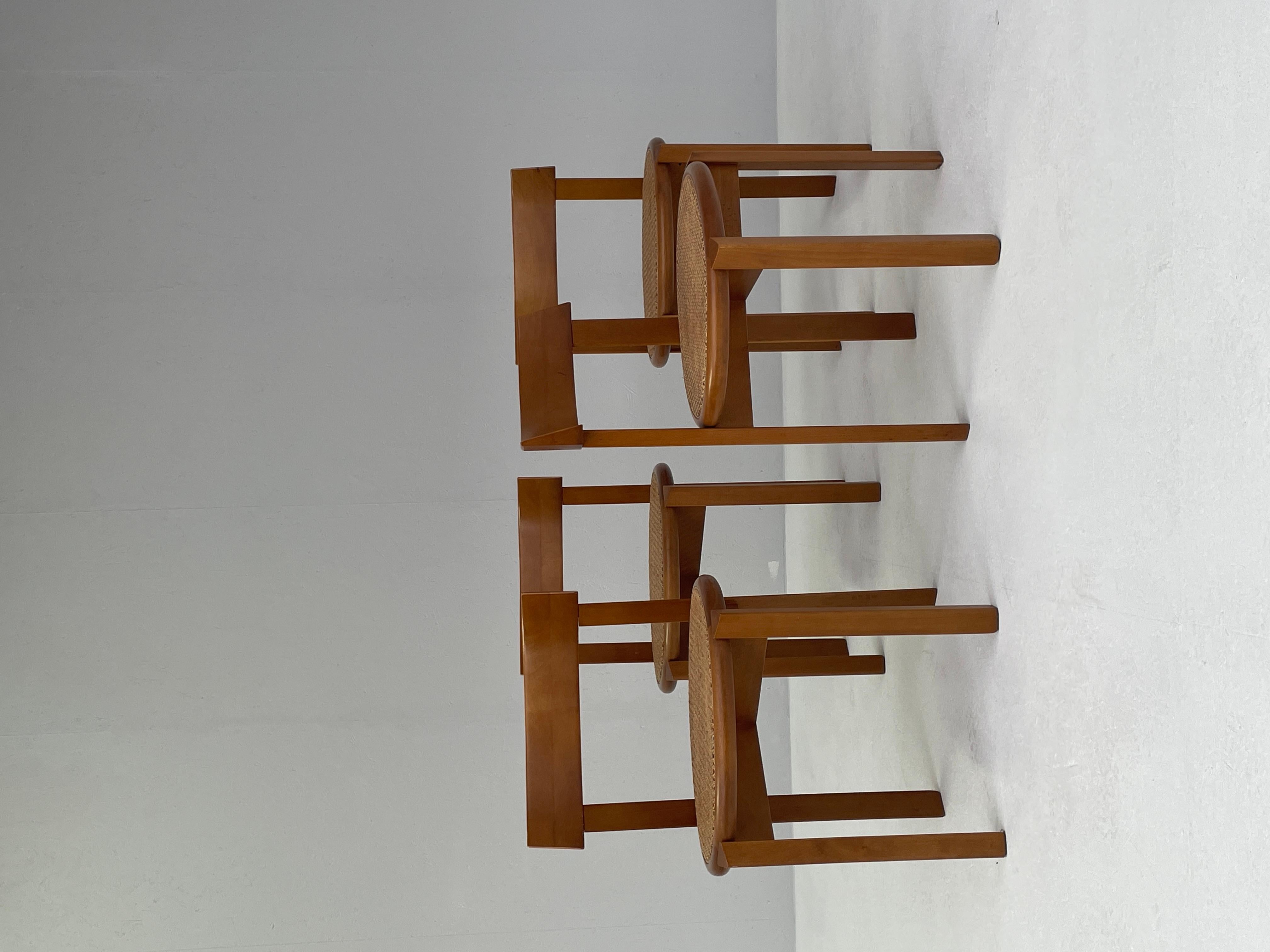 4 Italian wooden dining chairs with rattan seating at 1stDibs