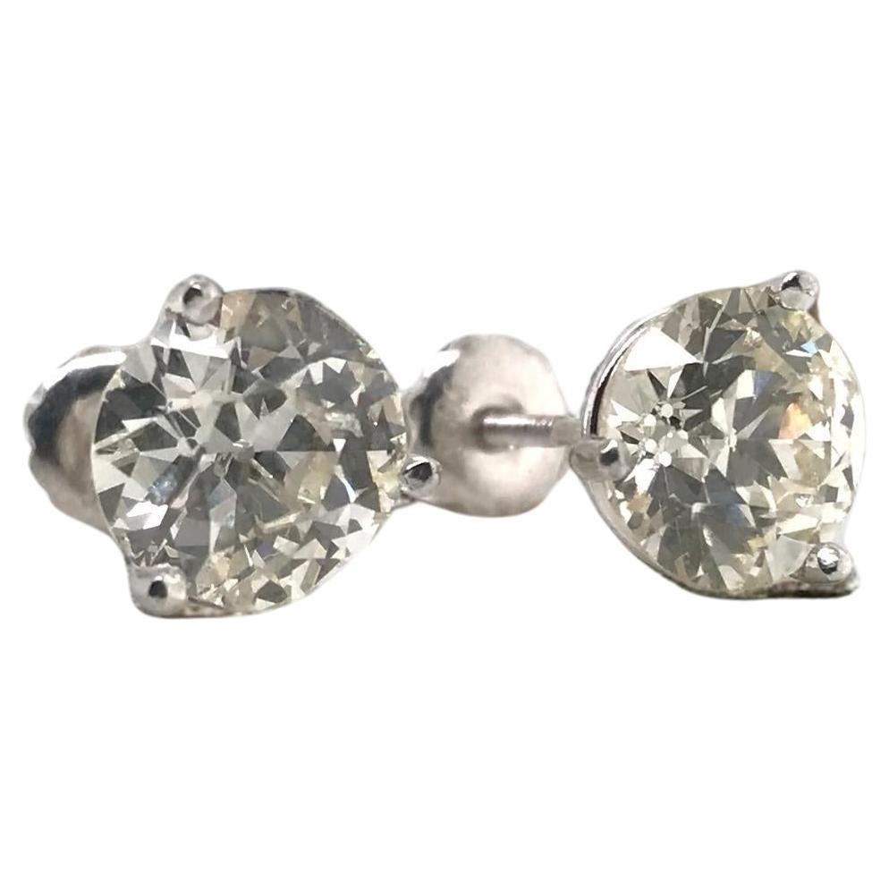 A pair of old European-cut diamond stud earrings For Sale at 1stDibs